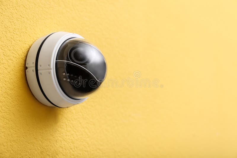 Modern CCTV Security Camera on Yellow Wall Stock Photo - Image of ...