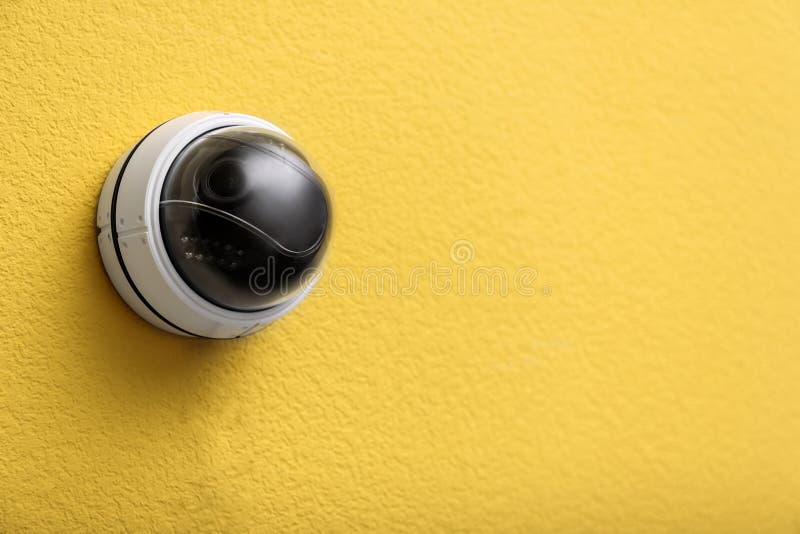 Modern CCTV Security Camera on Yellow Wall Stock Photo - Image of ...