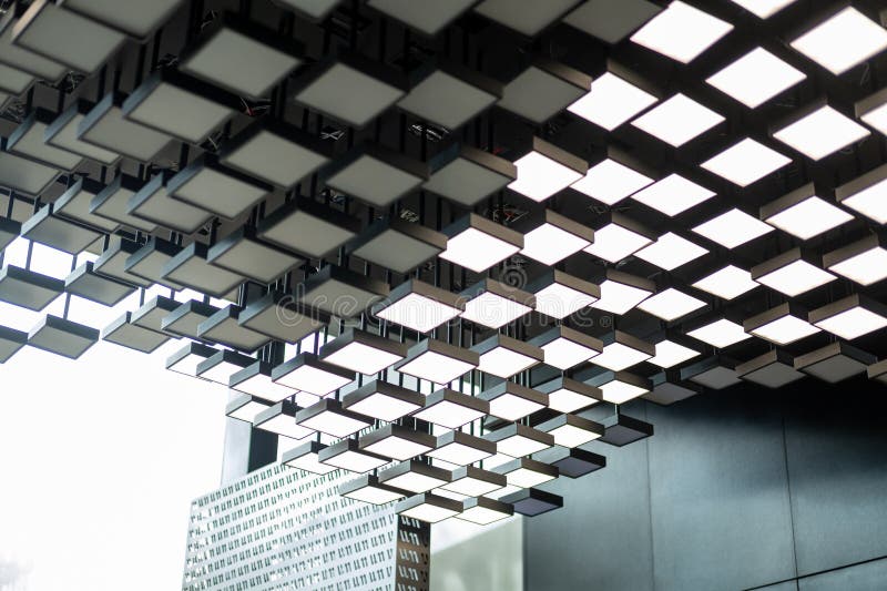 Modern Ceiling with a Grid of Illuminated Square Panels Stock Image ...