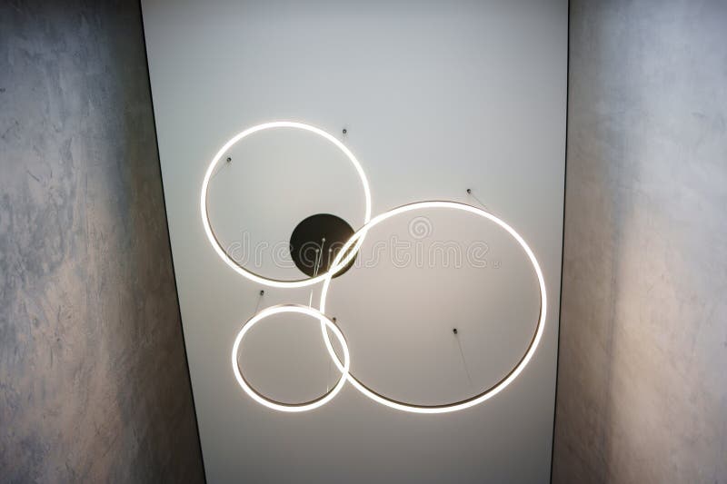 Modern Ceiling Lamp of Three Rings in the Interior. Stock Photo - Image ...