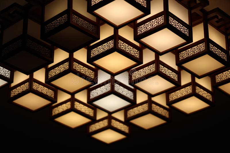 A Modern Ceiling Light Fixture with Multiple Lights Shining Down Stock ...