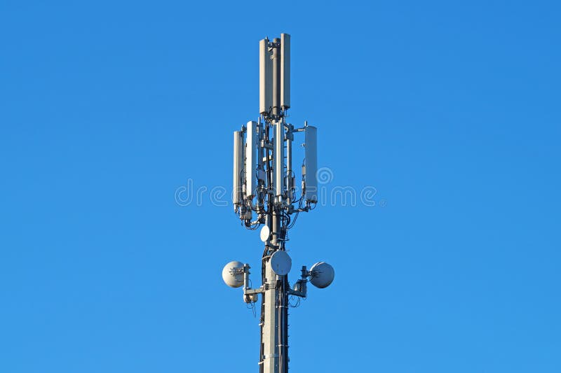 Modern Cellular Tower - Communication on Blue Sky. Vertical Photography ...