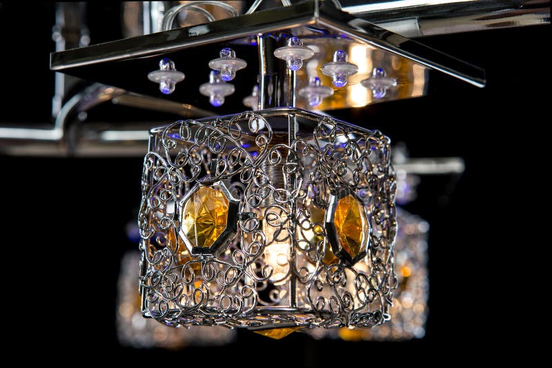 Modern chandelier on black stock photo. Image of design - 94197182