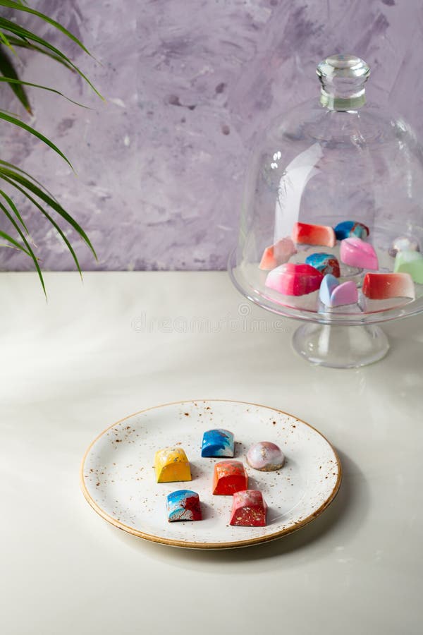 Modern Chocolate Candy on White Plate Stock Image - Image of expensive ...