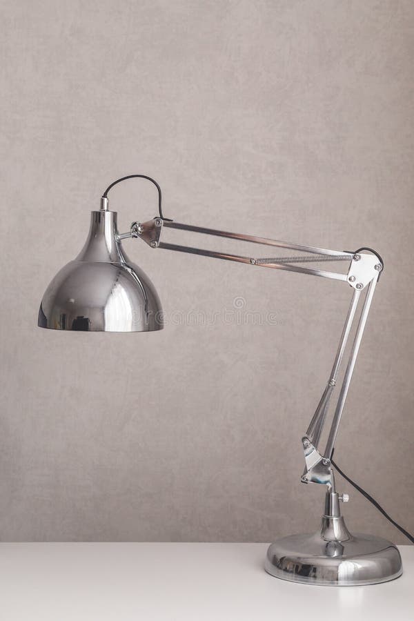 Modern Chrome Desk Lamp Switched on Stock Image - Image of color ...