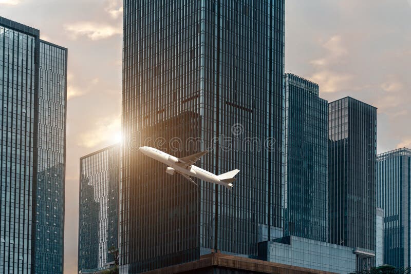 Airplane Fly Over Modern Cityscape and Office Buildings in Downtown ...
