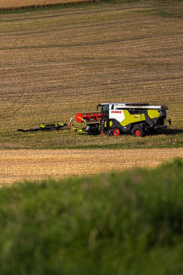 A Modern Claas Harvester on a Field Editorial Stock Photo - Image of ...