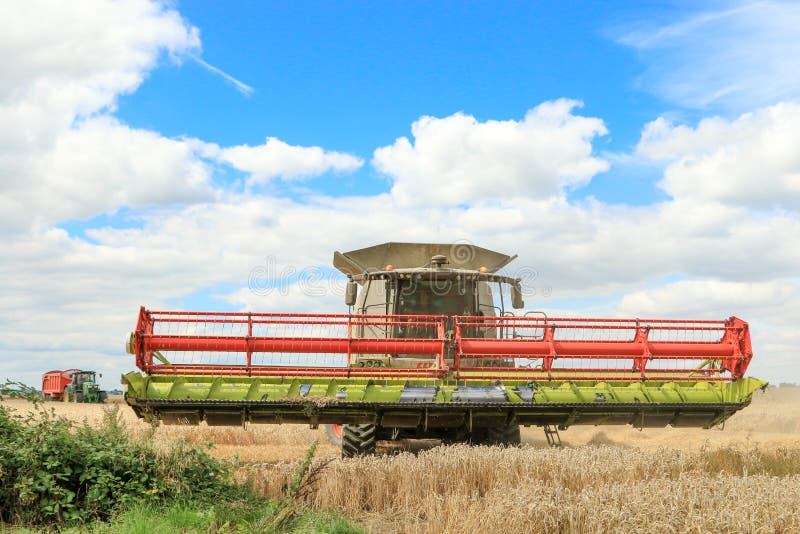 Modern Class Combine Harvester with Header in the Air Editorial Stock ...