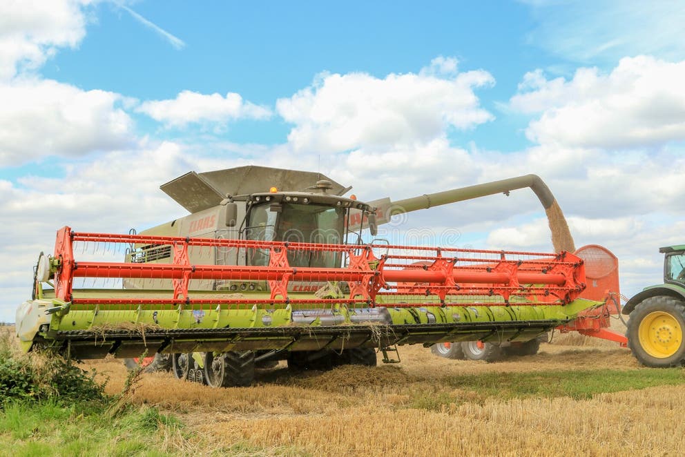 Modern Class Combine Harvester with Header in the Air Editorial Photo ...