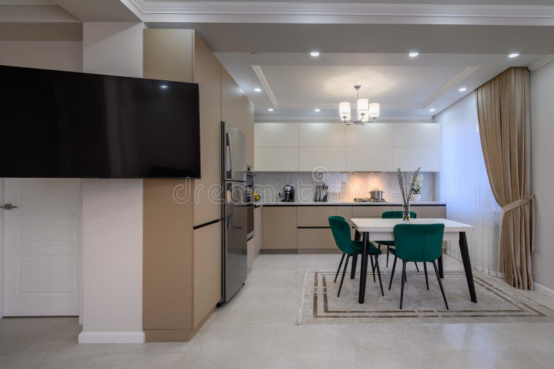 Modern Classic White and Beige Kitchen with Dining Room in the Interior ...