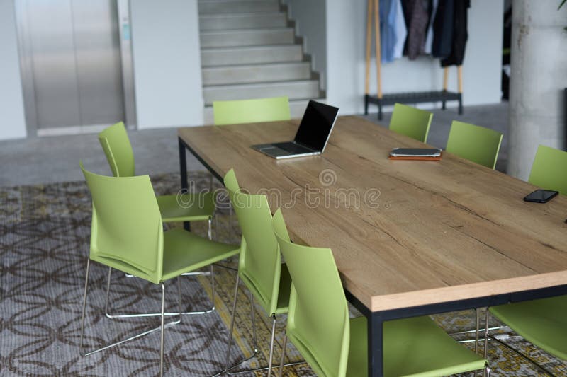 A Modern and Clean Office Space with a Wooden Conference Table and ...