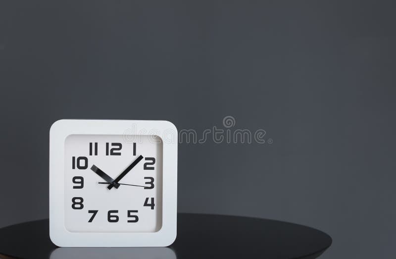 Modern clock on table stock image. Image of appointment - 122156651