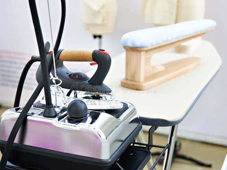Modern Clothes Iron and Ironing Board Stock Photo - Image of equipment ...