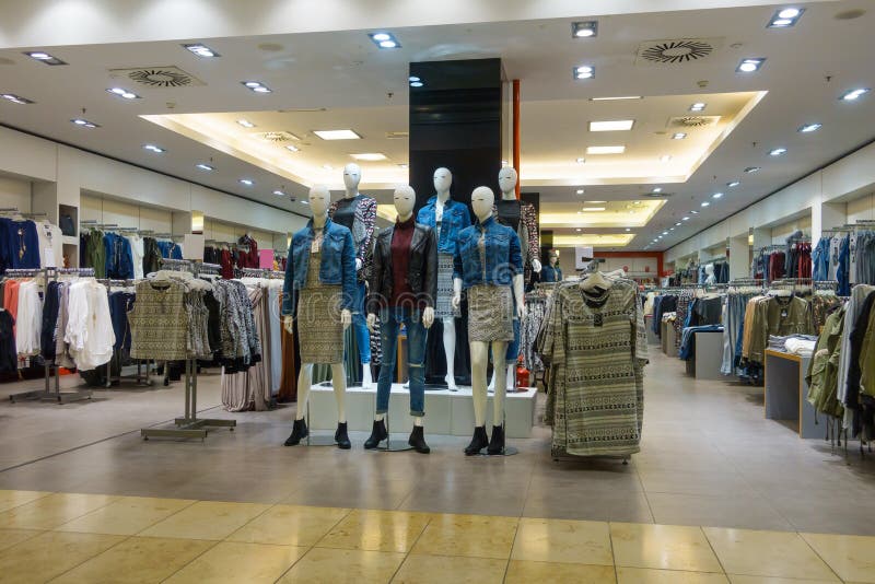 Modern Clothing Store Interior Stock Image - Image of traditional ...