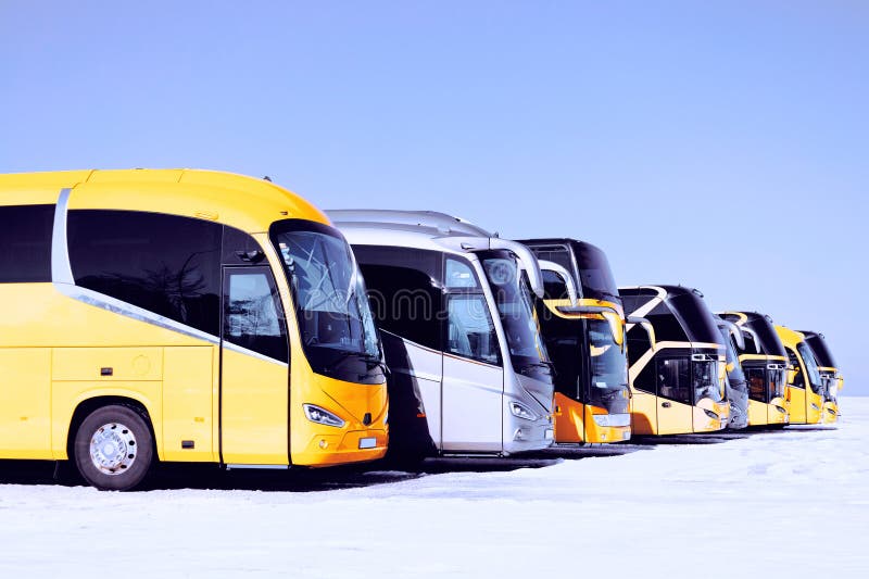 Modern Colorful Coaches and Buses Lined Up in a Parking Lot. Stock ...
