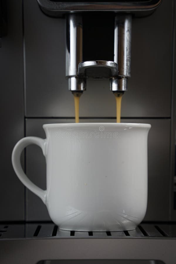 Modern Coffee Machine Cup and Flowing Coffee Stock Photo - Image of ...