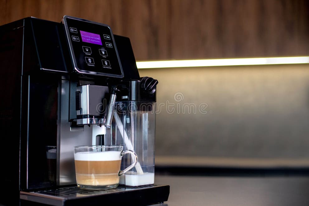 Modern Coffee Machine with Glass Cup of Latte in Kitchen Stock Photo ...