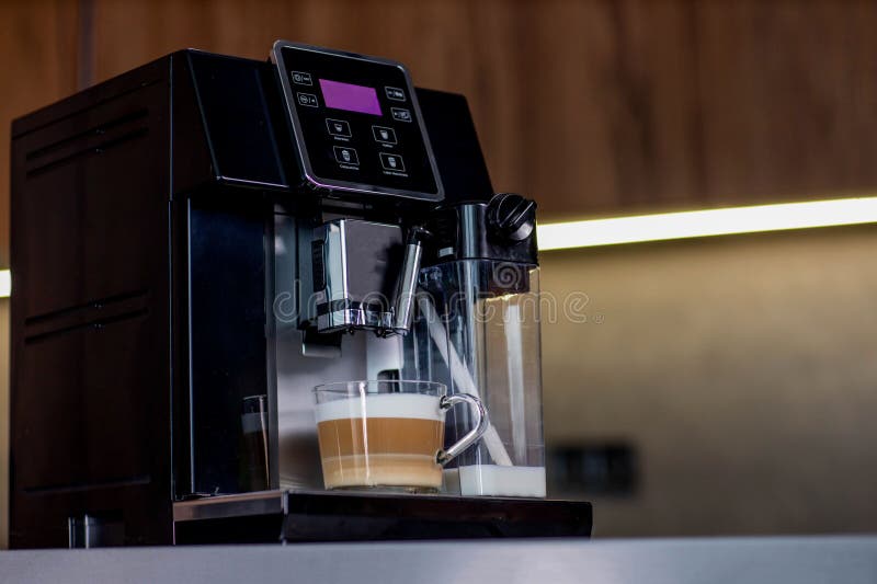 Modern Coffee Machine with Glass Cup of Latte in Kitchen Stock Photo ...