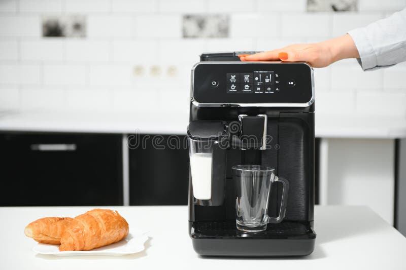 Modern Coffee Machine on Table in Kitchen Stock Photo - Image of ...