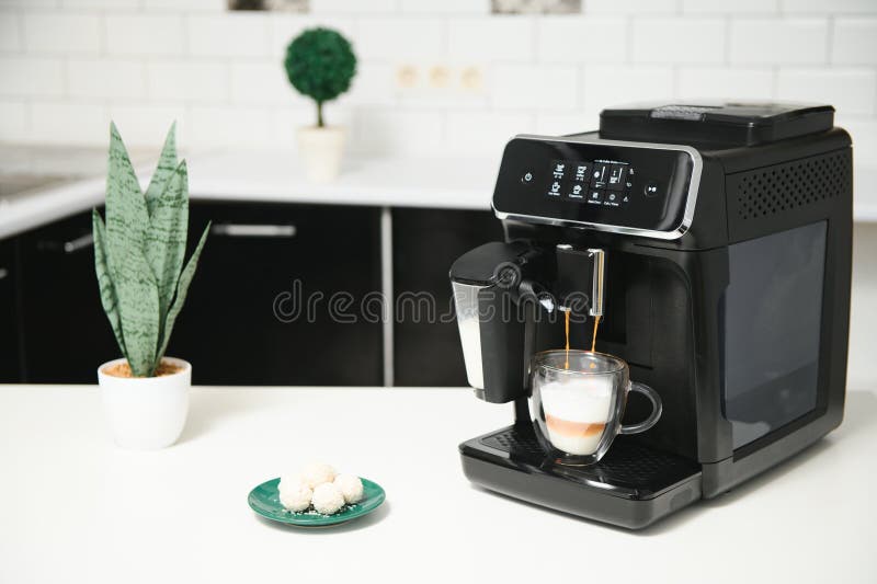 Modern Coffee Machine on Table in Kitchen Stock Image - Image of coffee ...