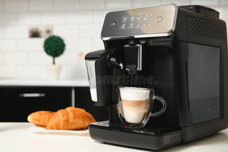 Modern Coffee Machine on Table in Kitchen Stock Photo - Image of home ...