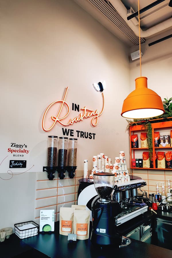 Modern Coffee Shop Interior with Espresso Machine and Neon Sign ...