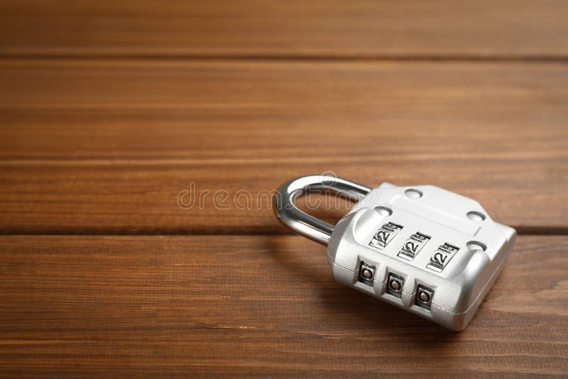 Modern Combination Lock on Wooden Table. Space for Text Stock Image ...