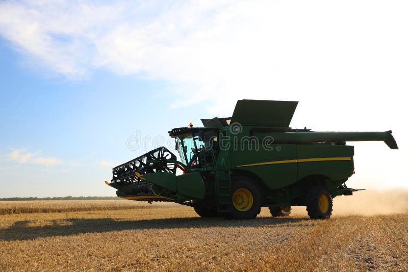 Modern Combine Harvester in Field. Agricultural Industry Editorial ...