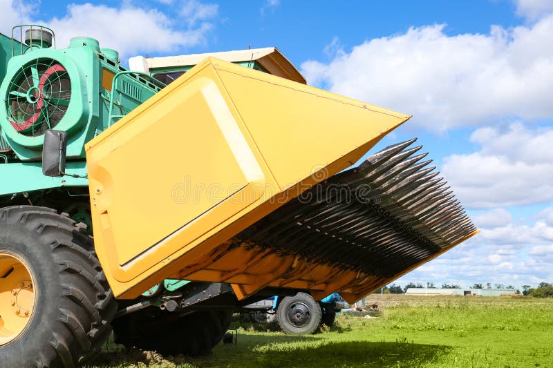 Modern Combine Harvester on Green Lawn with Fresh Grass Editorial Stock ...