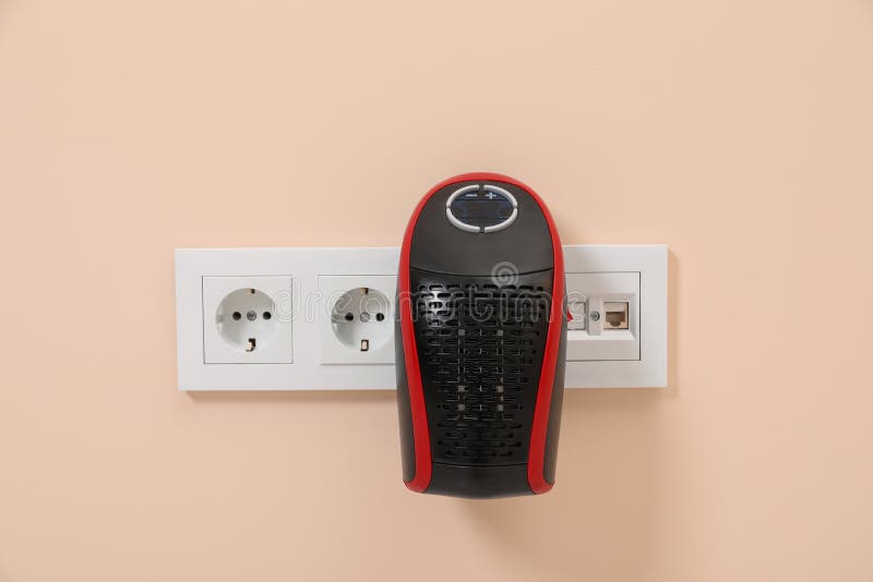 Modern Compact Electric Heater Charging from Socket Indoors Stock Image ...