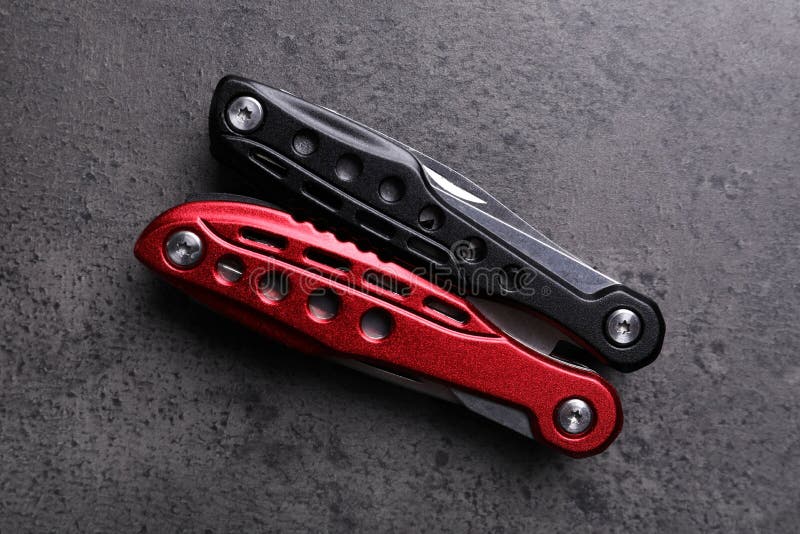 Modern Compact Portable Multitool on Grey Table. Space for Text Stock ...