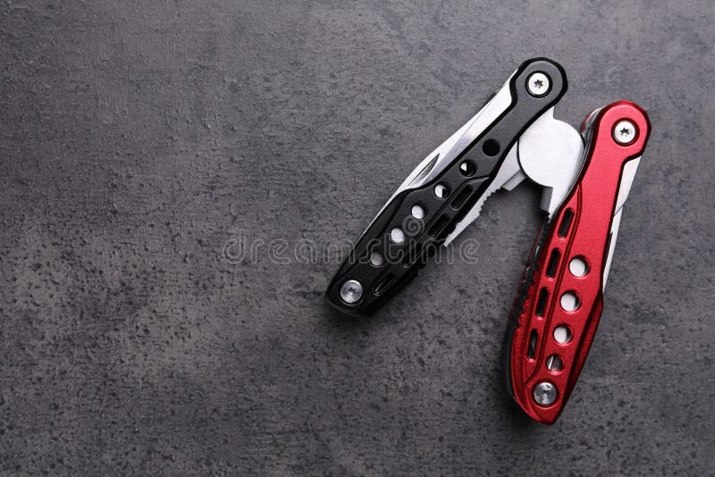 Modern Compact Portable Multitool on Grey Table. Space for Text Stock ...