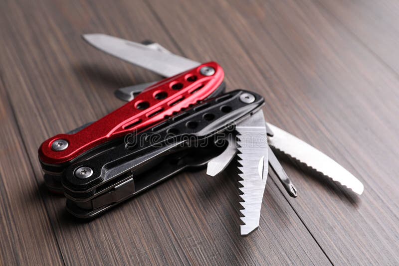 Modern Compact Portable Multitool on Wooden Table Stock Image - Image ...