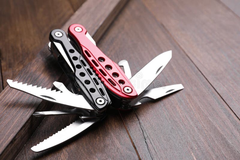 Modern Compact Portable Multitool on Wooden Table Stock Image - Image ...