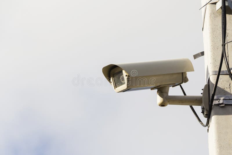 Modern Compact Video Surveillance Camera on Support Post in Public ...