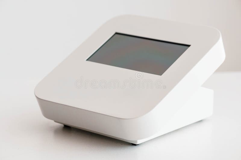 Modern Compact White Electronic Device with Digital Display Screen on ...