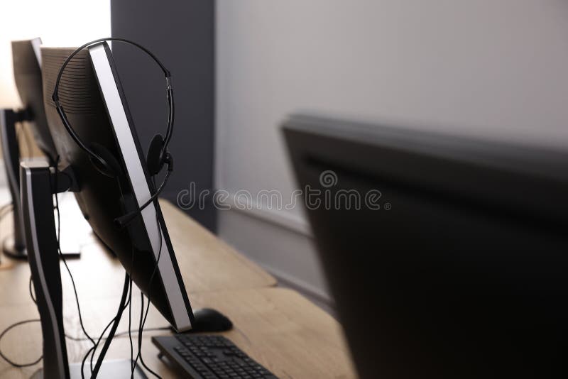 Modern Computer with Headset in Office. Hotline Service Stock Image ...