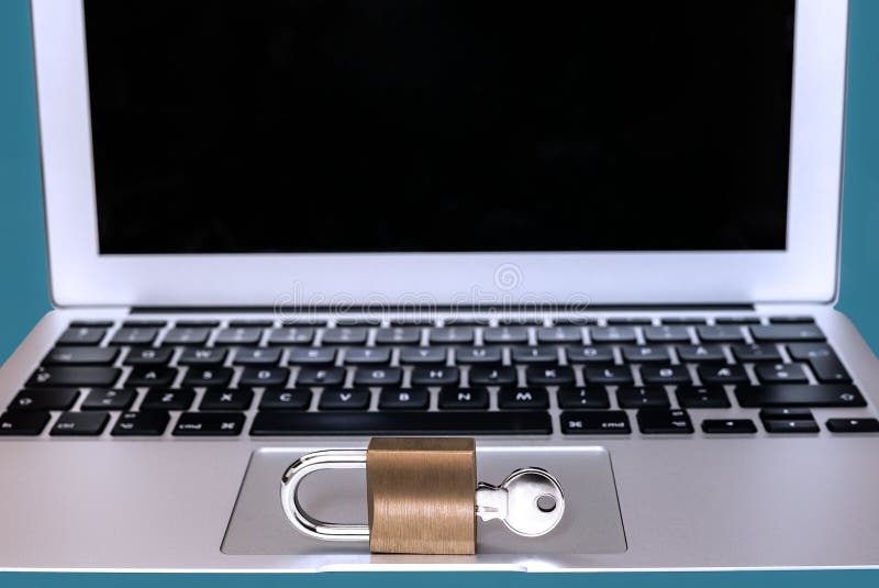 Modern Computer with a Lock and Key in Front - Concept of Safe Stock ...
