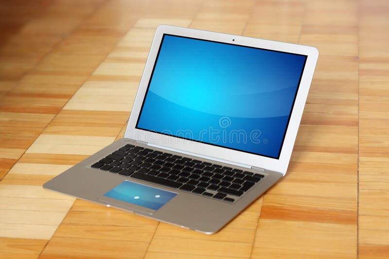 Modern Conceptual Laptop Computer on Wooden Floor Stock Image - Image ...
