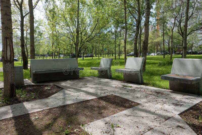 Modern Concrete Benches and Path in a Public Park. Stock Photo - Image ...
