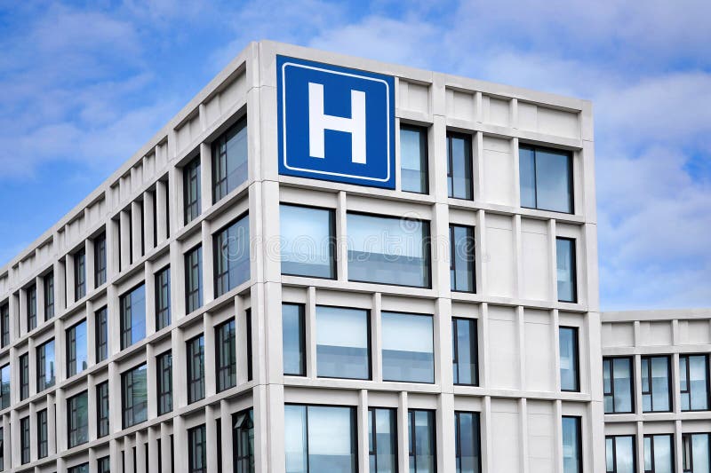 Building with Large H Sign for Hospital Stock Photo - Image of letter ...
