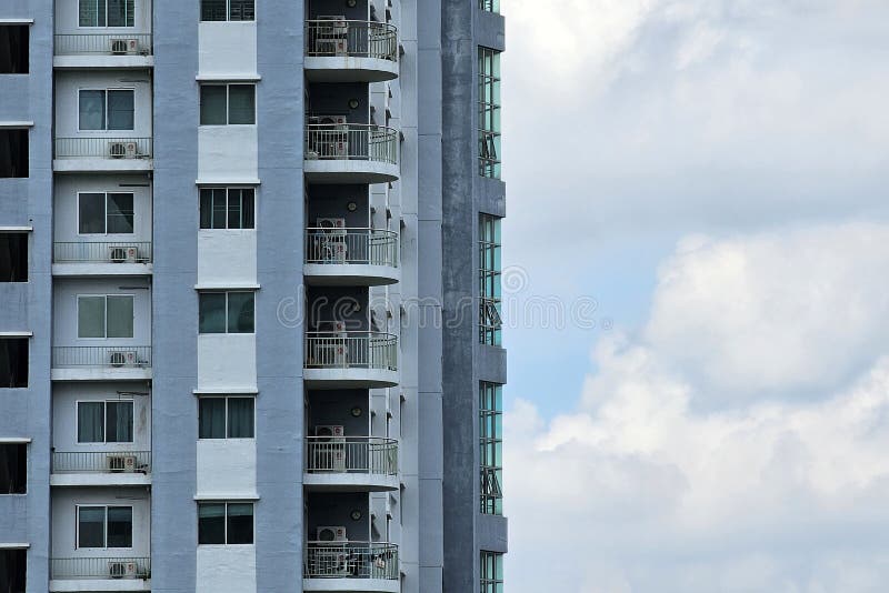 Modern Condominium Building with Space of Cloudy Sky Background. Stock ...
