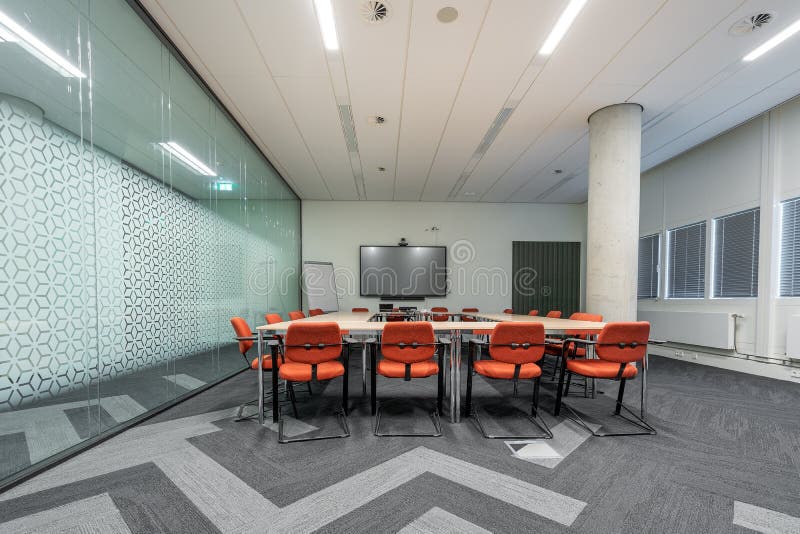 Modern Conference Room with Colored Chairs Stock Image - Image of space ...