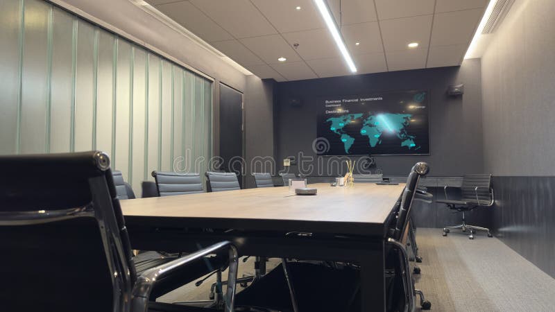 A Modern Conference Room with a Large Screen Displaying Data and a ...