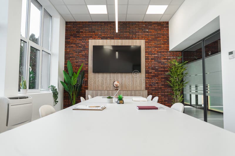 Modern Conference Room with Large Windows and Flat Screen TV Stock ...