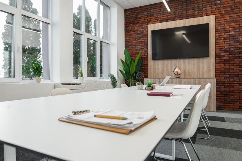 Modern Conference Room with Large Windows and Flat Screen TV Stock ...