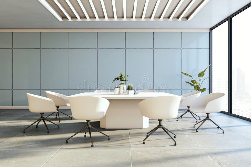 Modern Conference Room with White Chairs Around a Table in a Bright ...