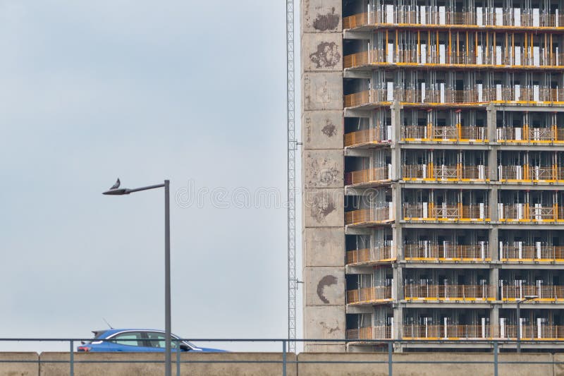 A Modern Construction Site with a High-rise Building Under Construction ...