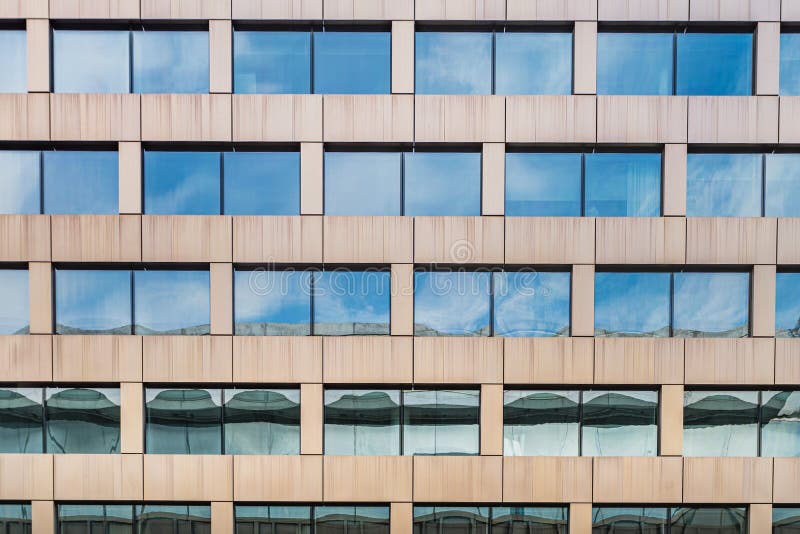 A Contemporary Office with a Broad Modern, Glazed Facade Featured by ...