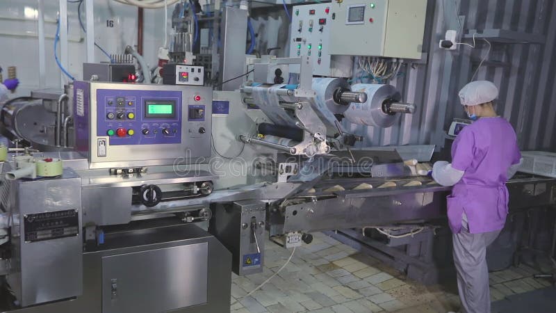 A Modern Conveyor for the Production of Ice Cream. Ice Cream Production ...